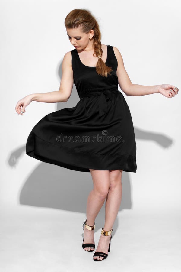 Brunette in black dress stock photo. Image of gracious - 47014154