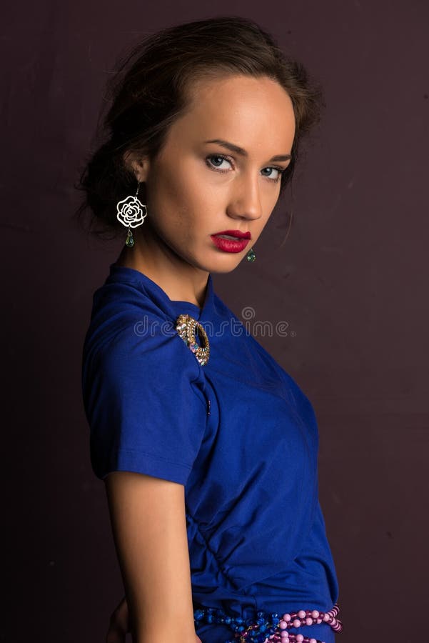 Brunette in blue stock image. Image of hair, spaghetti - 132218779