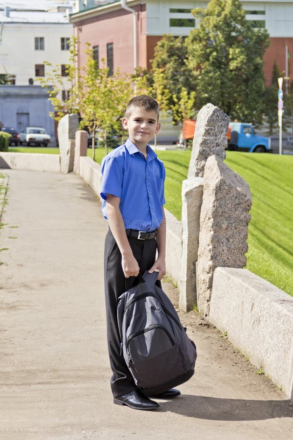 Brunette Boy with School Backpack Stock Image - Image of serious, eight ...