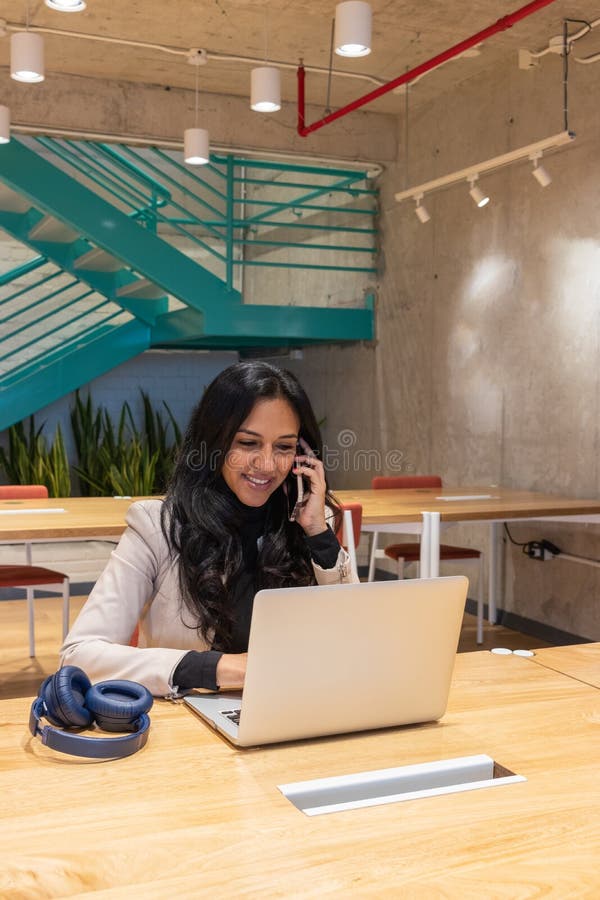 Brunette Woman Working from Her Workspace Stock Photo - Image of desk ...