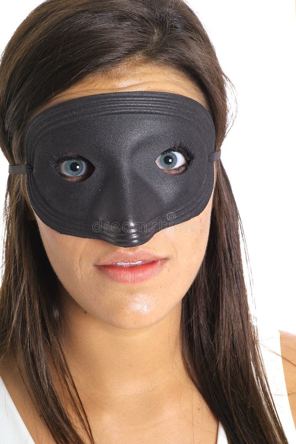 Brunette eyes in a mask stock photo. Image of person - 14754228