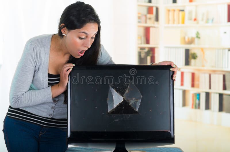 Brunette Female Looking Over Broken Computer Stock Photo - Image of ...