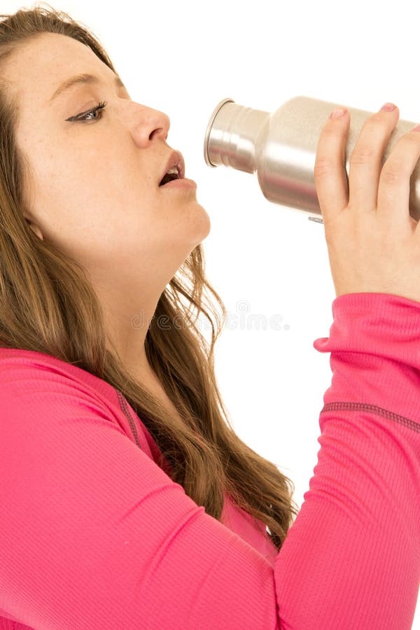 Brunette Female Model Holding a Metal Container Ready To Drink Stock ...