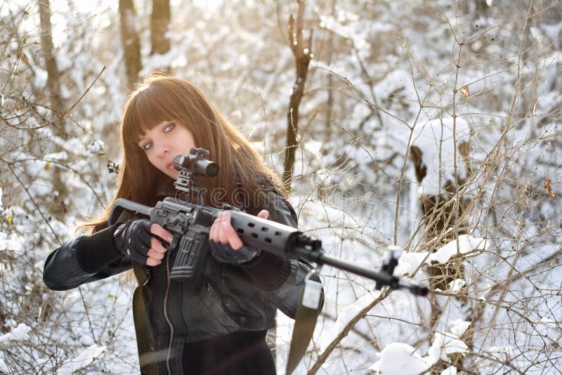 Brunette Girl Aiming A Gun Royalty Free Stock Images - Image: 29037679