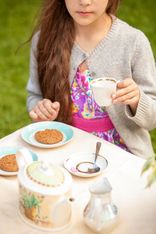 Brunette Girl Drinking Tea at Cafe Terrace Stock Image - Image of ...
