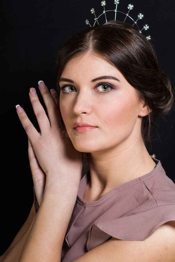 Brunette Girl With Natural Make Up Retro Hairstyle And Crown Stock