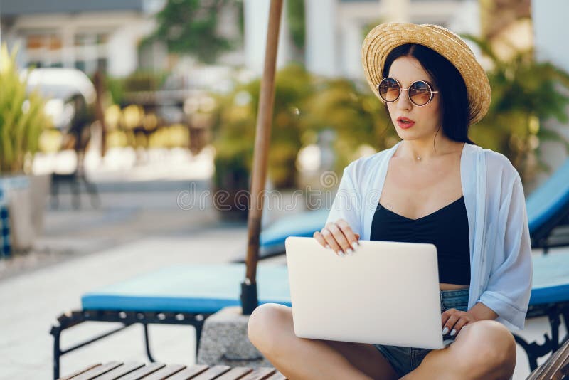 Brunette Girl Working by the Pool Stock Photo - Image of office ...