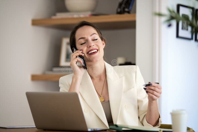 Brunette Haired Business Woman Using Laptop Having Call And Working