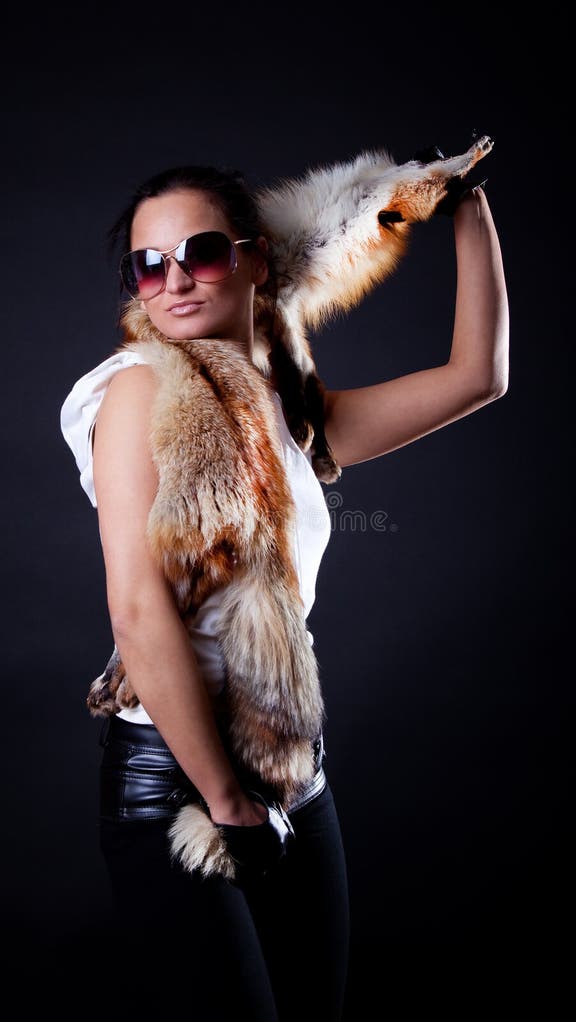 Brunette holding fox skin stock photo. Image of cute - 12363614