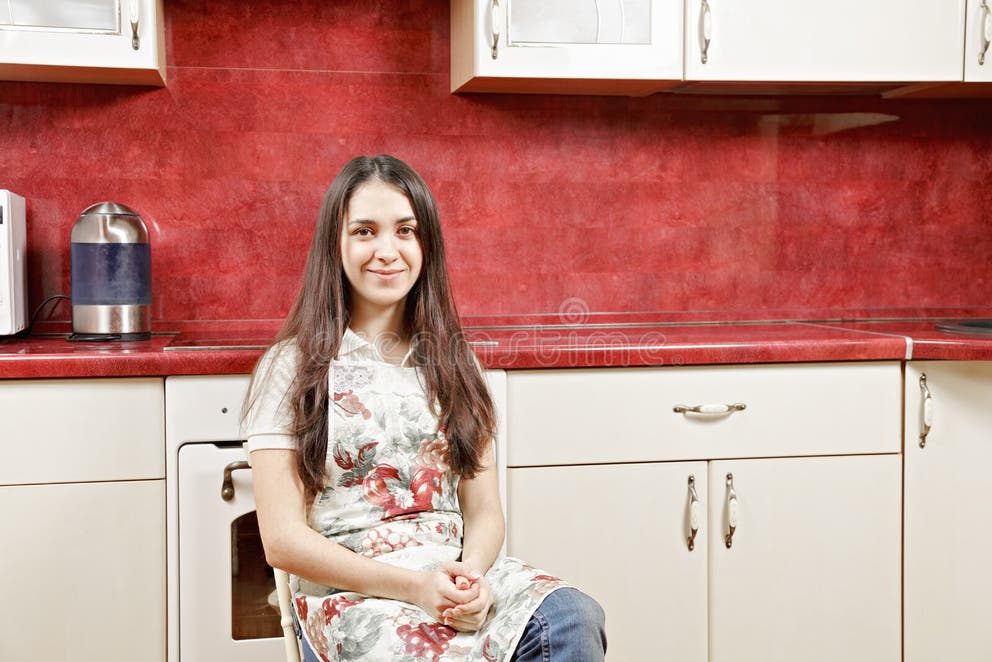 Brunette Housewife in Kitchen Stock Image - Image of smiling, cooker ...