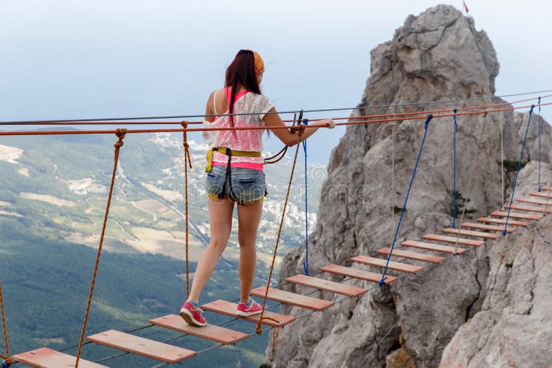 Brunette with Insurance on Ladder Stock Photo - Image of morning ...