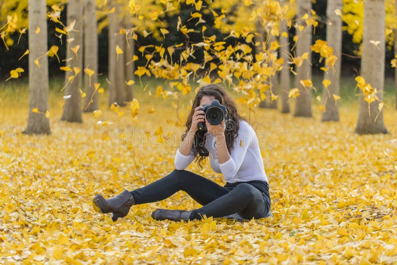 Brunette Model in Fall Foliage with DSLR Camera Stock Photo - Image of ...