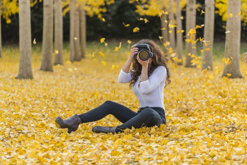 Brunette Model in Fall Foliage with DSLR Camera Stock Image - Image of ...