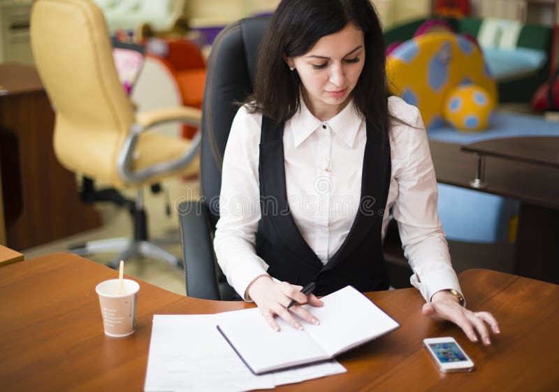 Brunette in the office stock image. Image of modern, computer - 68187379