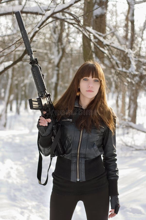 Brunette with the Raised Rifle Stock Image - Image of adult, armed ...