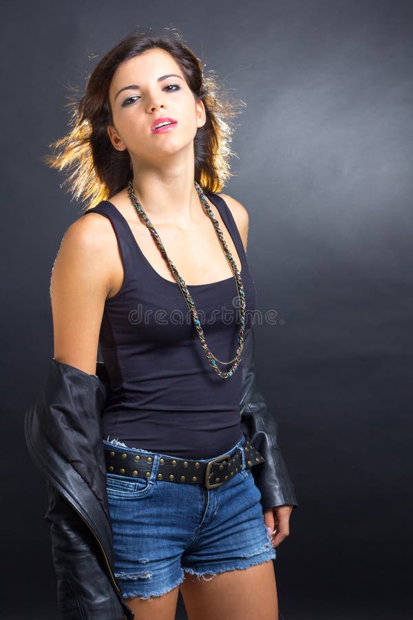 Brunette Rocker Girl stock image. Image of female, touch - 3067921