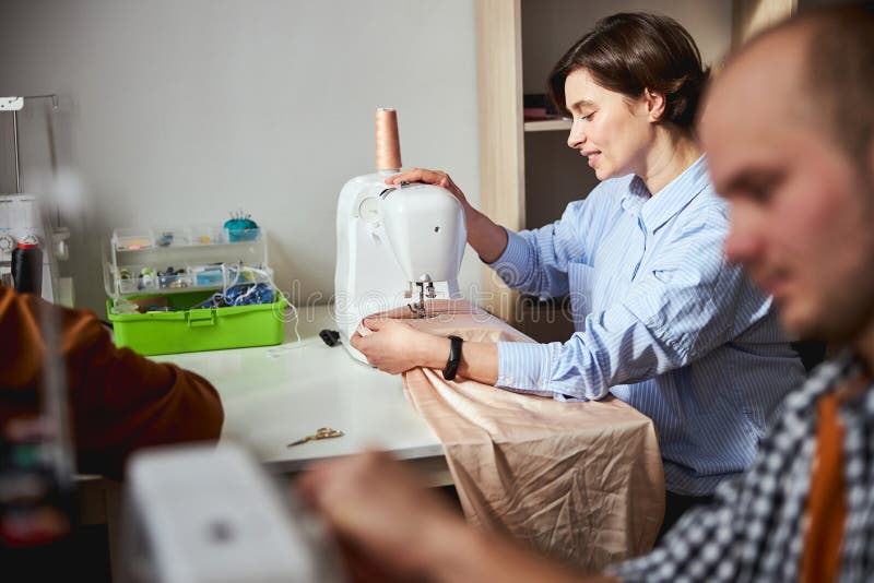 Brunette Stitching Fabric Cut with White Machine Stock Photo - Image of ...