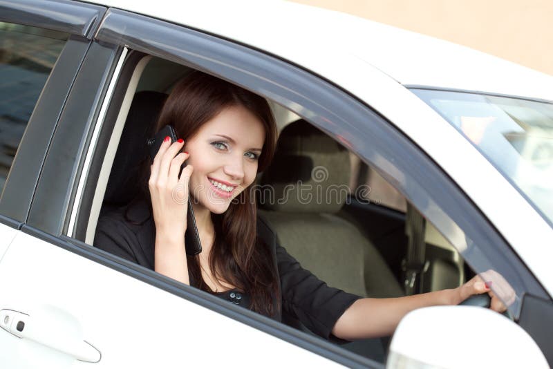 Brunette Woman in Car Calling Stock Photo - Image of outdoors, person ...