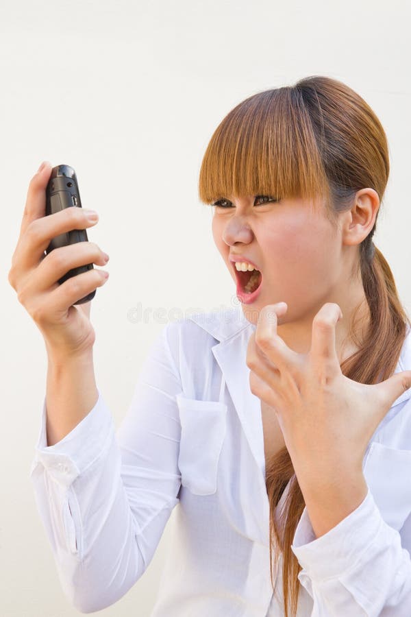 Brunette Woman Screaming at Phone Stock Image - Image of caucasian ...