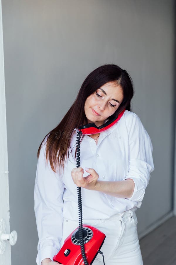 Beautiful Brunette Woman Talking on Old Corded Phone Stock Photo ...