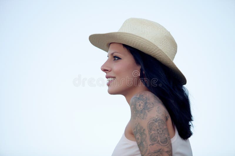 Brunette Woman with Tattoo on the Arm Looking Forward Stock Image ...