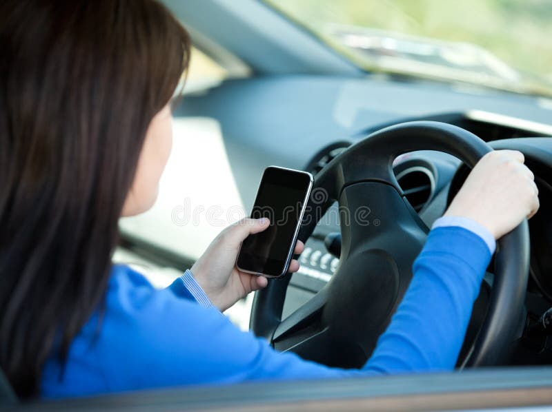 Text SMS while Driving stock image. Image of cellphone - 11619991