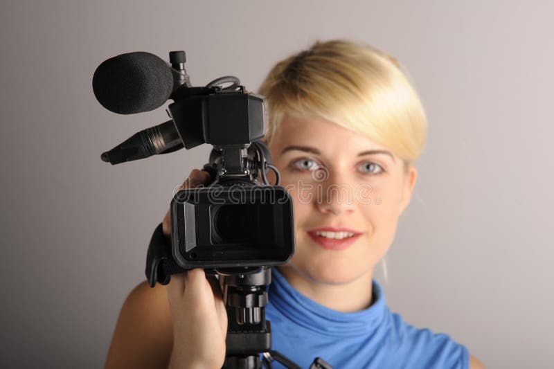 Brunette Woman with Video Camera. Stock Photo - Image of professional ...