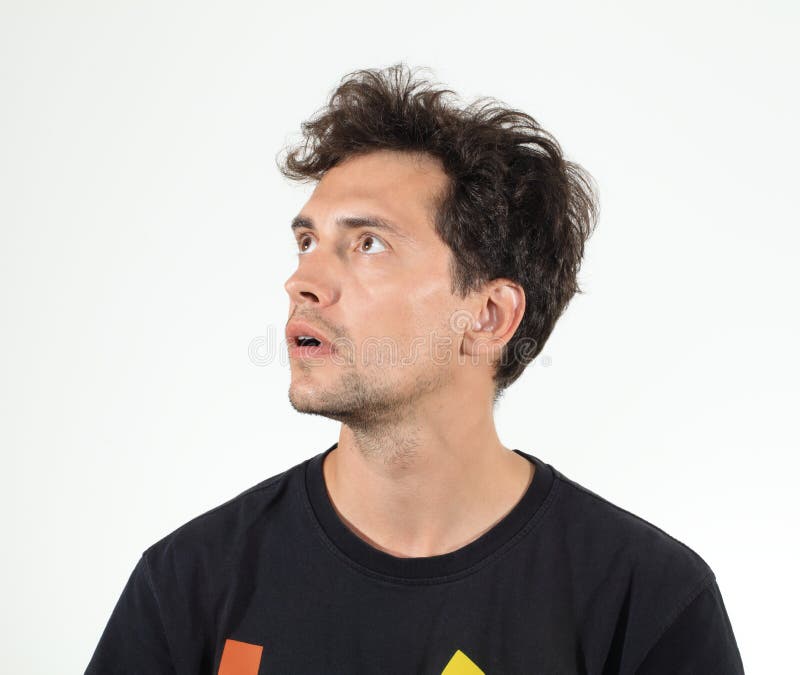 Brunnette Man Looking Right Up Stock Photo - Image of wall, male: 129307420