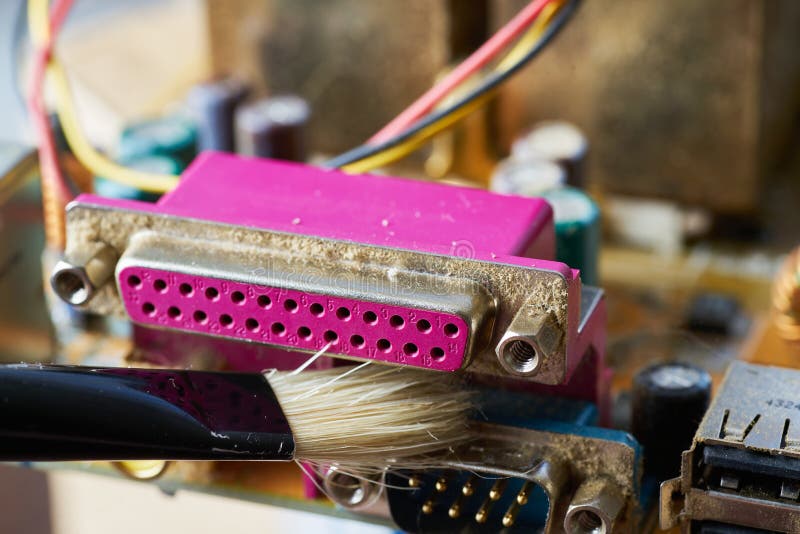Brush Cleaning an Old Computer Board from Dust and Dirt. Close-up ...