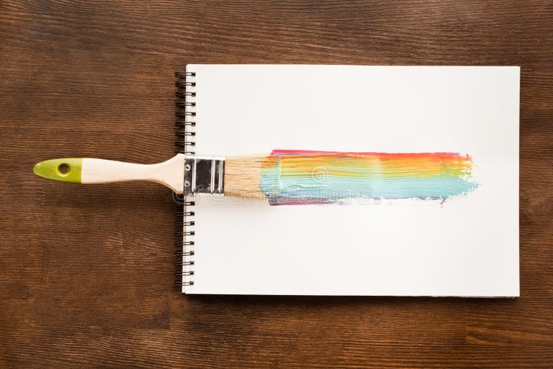 Brush and Colorful Brushstroke on Paper on Table Stock Photo - Image of ...