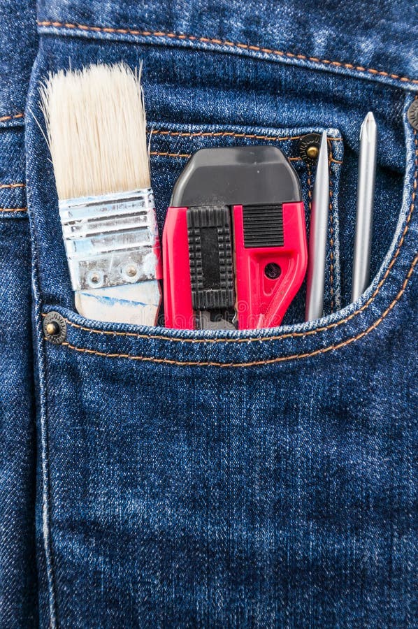 Brush, Cutter and Screwdriver in Blue Jean Pocket Stock Image - Image ...