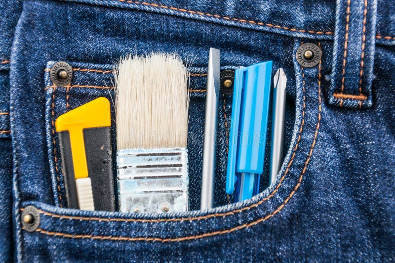 Brush, Cutter and Screwdriver in Blue Jean Pocket Stock Photo - Image ...
