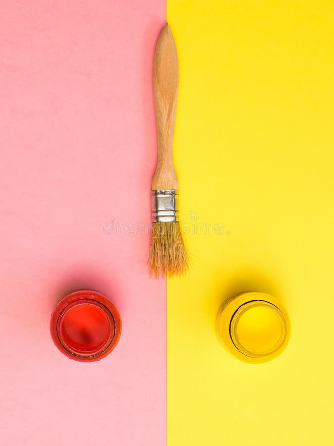 Brush, Jars of Red and Yellow Paint on a Yellow and Pink Background ...