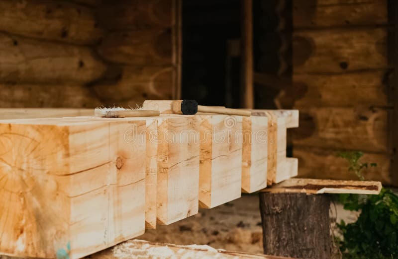 Brush and Mallet on a Wooden Bar. Construction of a Wooden House Stock ...