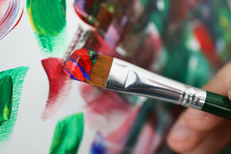 Brush With Multi-colored Paints On Background Of Picture Stock Photo ...