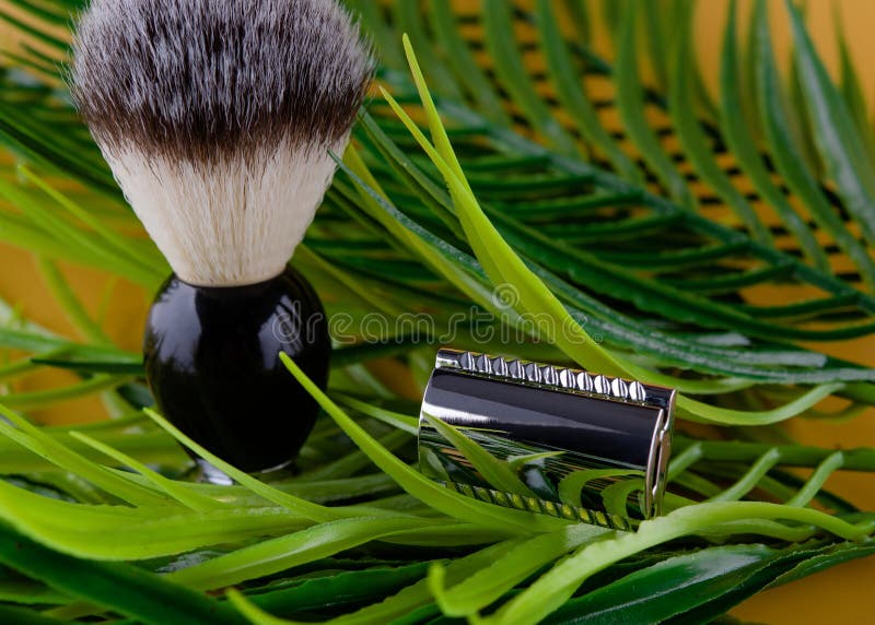 Old Style Razor, Brush, on a Stand Against a White Background Stock ...