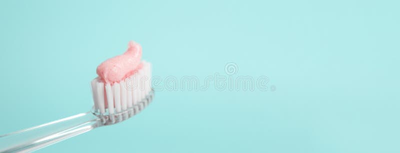 Brush with Toothpaste on Light Blue Background, Space for Text. Banner ...