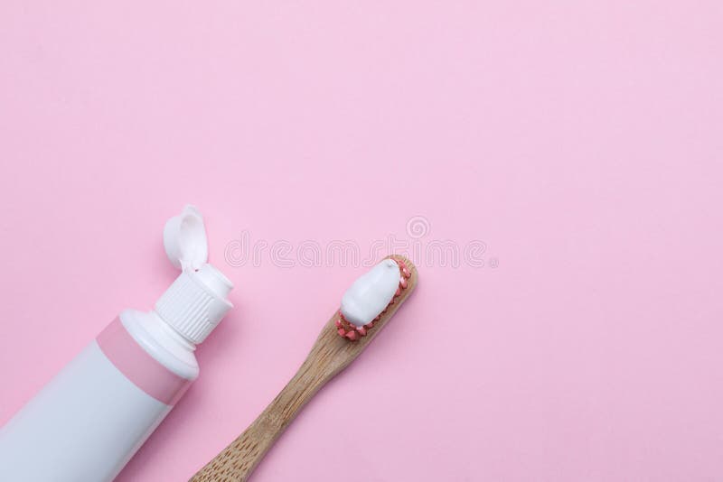 Brush with Toothpaste and Tube on Pink Background, Flat Lay. Space for ...