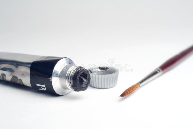 Brush and tube of paint stock photo. Image of designer - 27832960