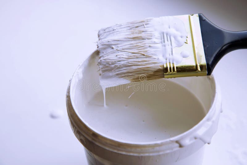 Brush with white paint stock photo. Image of worker, building - 42190622
