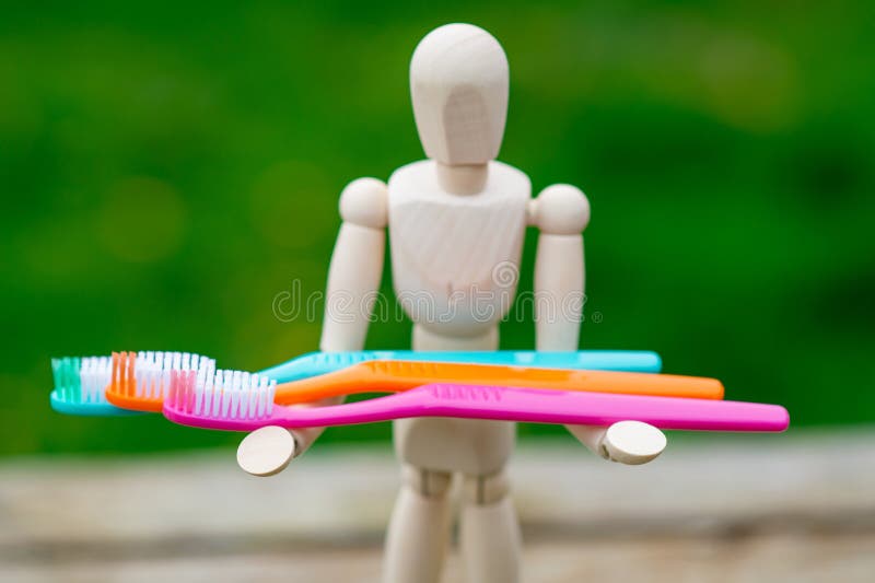 Brush Your Teeth Concept. the Figure of a Man Holds Multi-colored ...