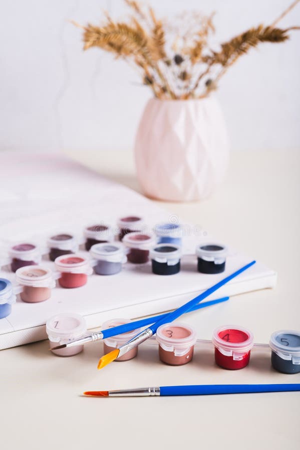 Brushes, Multi-colored Acrylic Paints and Canvas for Painting by ...