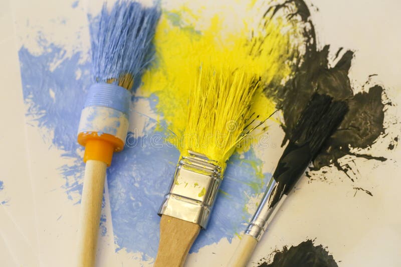 Brushes in Multi-colored Paints Stock Image - Image of paintbrush ...