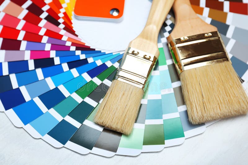 Brushes and Paint Color Palette Samples on Table Stock Image - Image of ...
