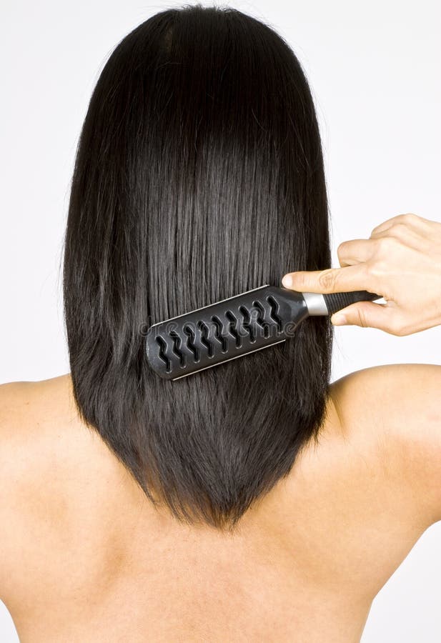 Brushing Long Black Hair stock photo. Image of straight - 8073908