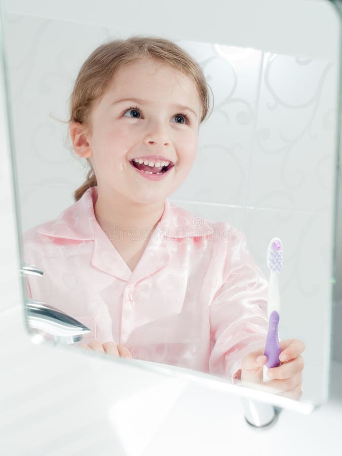 Brushing teeth stock photo. Image of pretty, cleaning - 14579656
