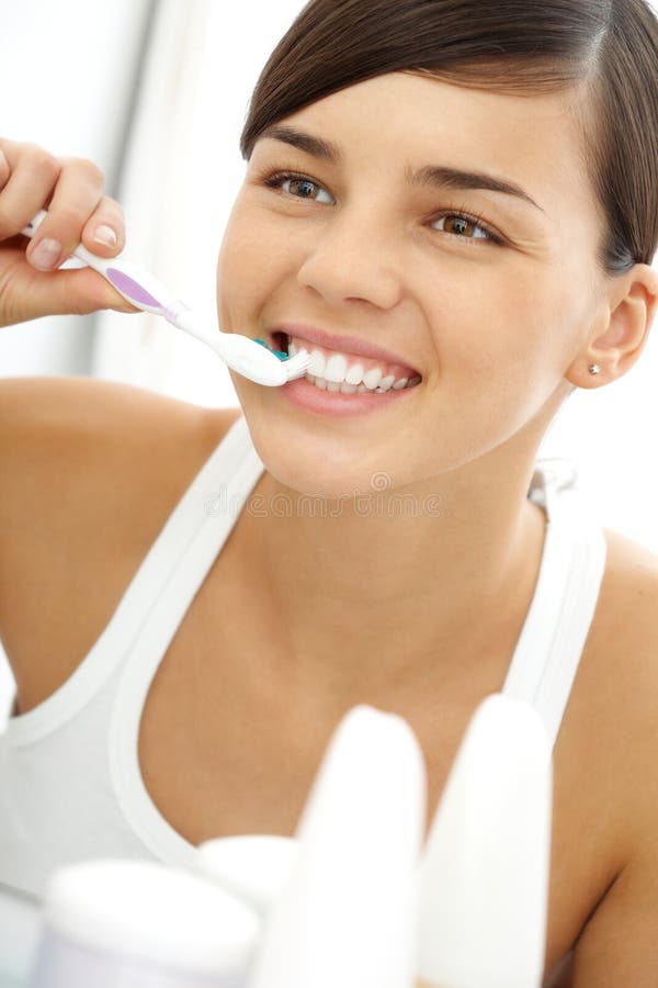 Brushing teeth stock image. Image of care, female, dental - 29516097