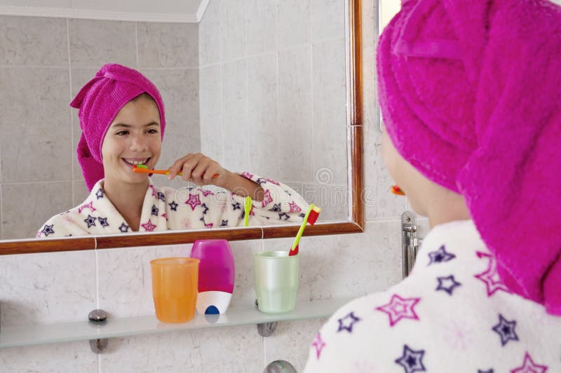 Brushing Teeth in Bath Robe Stock Image - Image of domestic, dental ...