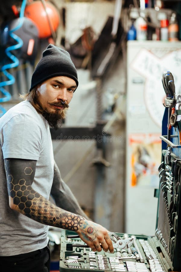 Brutal Bearded Mechanic in Garage Stock Image - Image of service, hobby ...