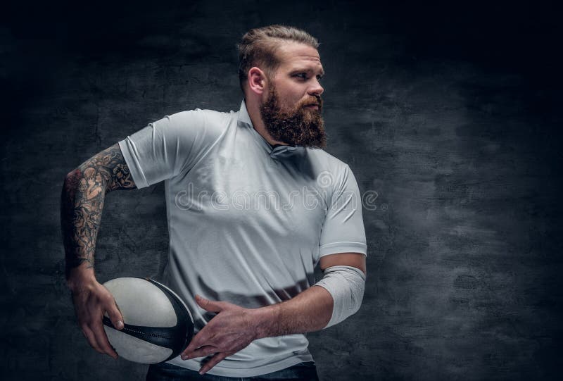 Bearded Rugby Player Holds Game Ball. Stock Image - Image of male ...